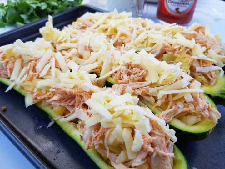 Healthy Buffalo Chicken Stuffed Zucchini - Hint of Healthy