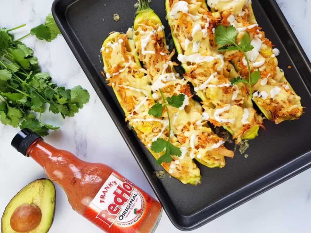 Healthy Buffalo Chicken Stuffed Zucchini - Hint of Healthy