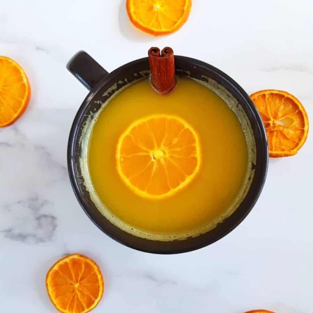 Spiced Hot Orange Juice with Cinnamon {Healthy Drink} - Hint of Healthy